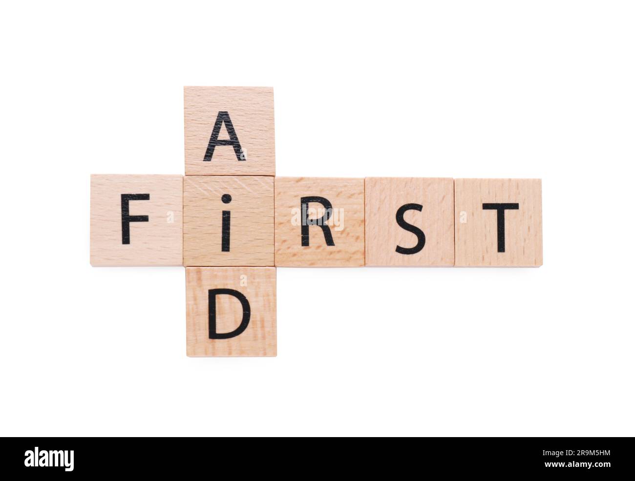 Words First Aid made of wooden cubes isolated on white, top view Stock ...