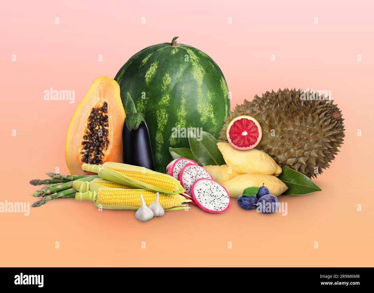 Fresh fruits and vegetables on coral pink gradient background Stock Photo - Alamy