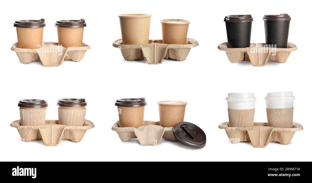 Takeaway paper cups with coffee in cardboard holders isolated on white ...