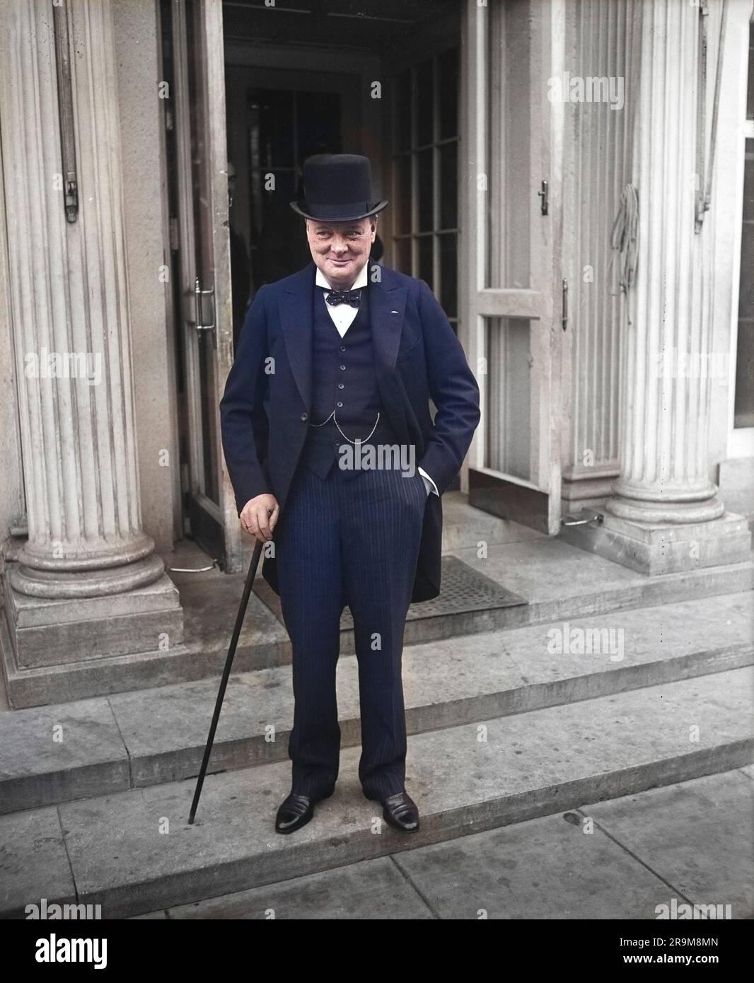 Winston Churchill, full-length portrait, formal attire and walking ...