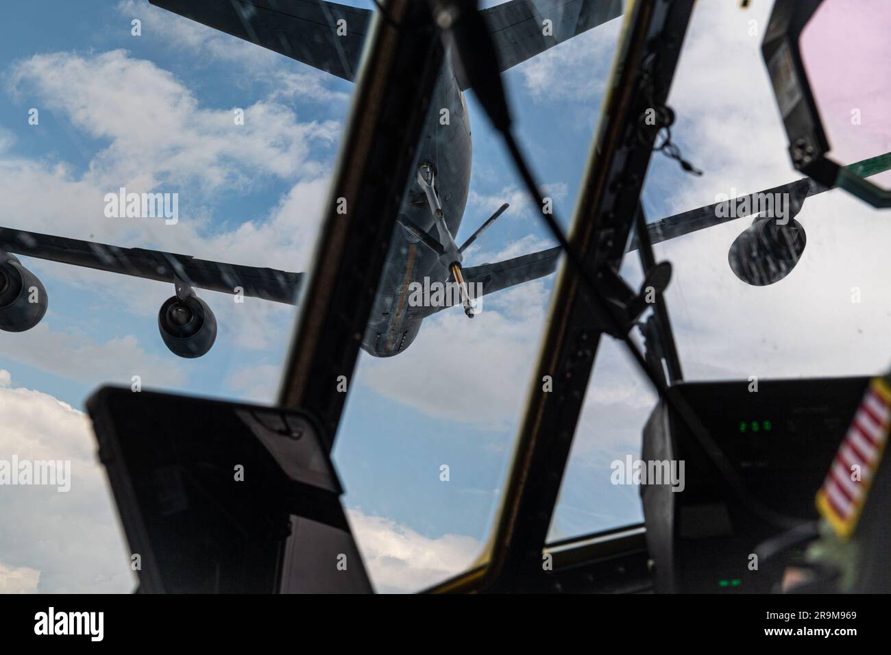 A KC-135R from the 171st Aerial Refueling Wing flies in formation with ...