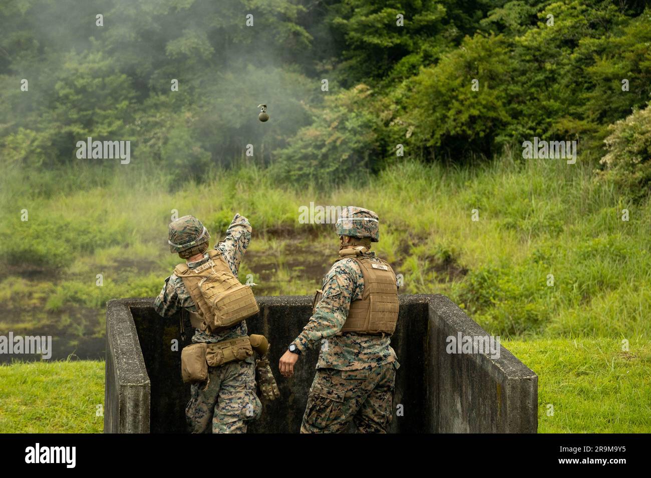 U.S. Marine Corps Lance Cpl. Hunter Wheatley, left, a motor vehicle ...