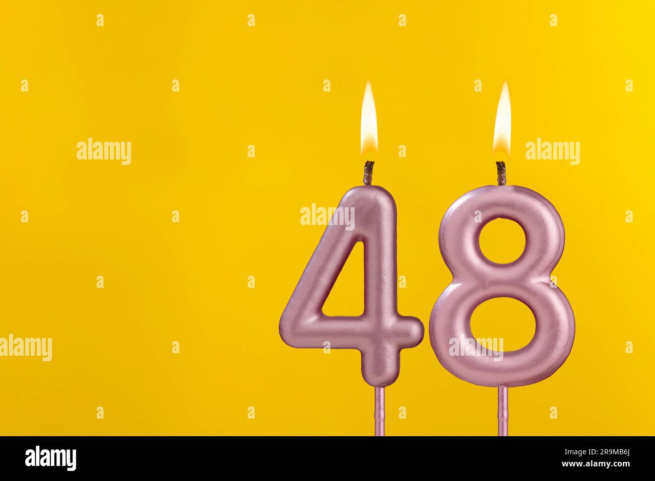Candle 48 with flame - Birthday card on yellow luxury background Stock ...