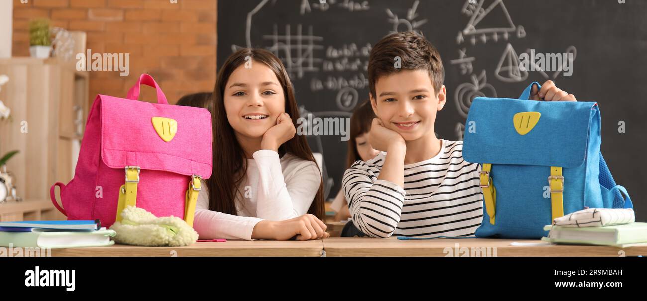Children backpacks classroom table hi-res stock photography and images ...