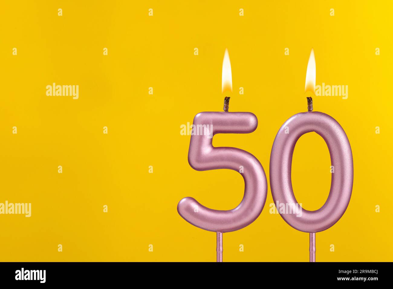 Candle 50 with flame - Birthday card on yellow luxury background Stock ...