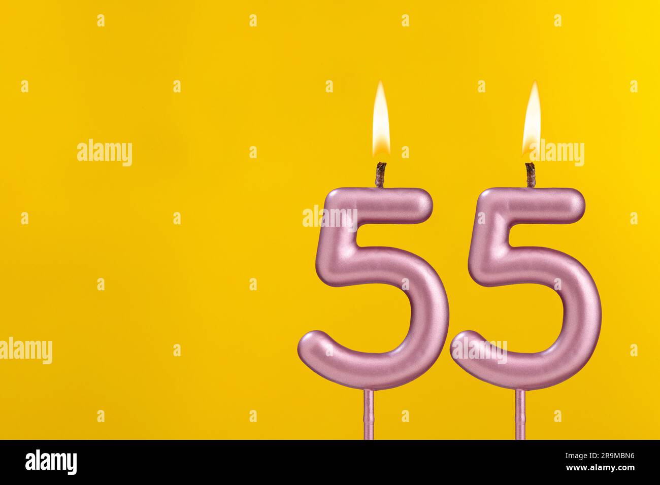 Birthday candle number 55 - Birthday celebration on yellow background ...