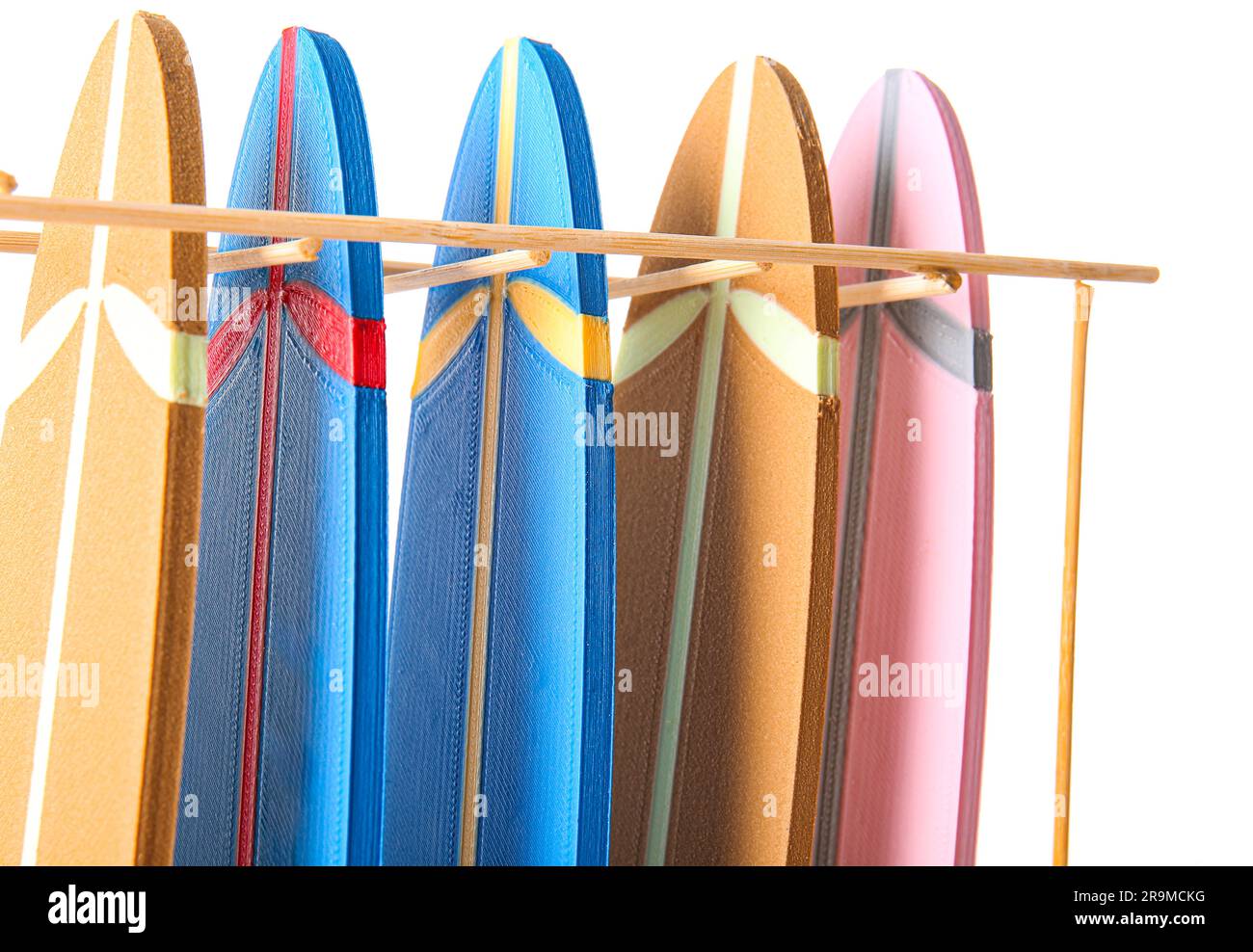 Stand with mini different surfboards isolated on white background Stock ...