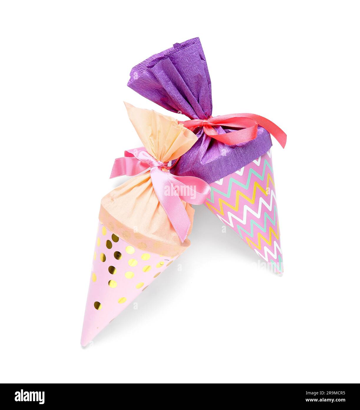 Purple school cones isolated on white background Stock Photo - Alamy