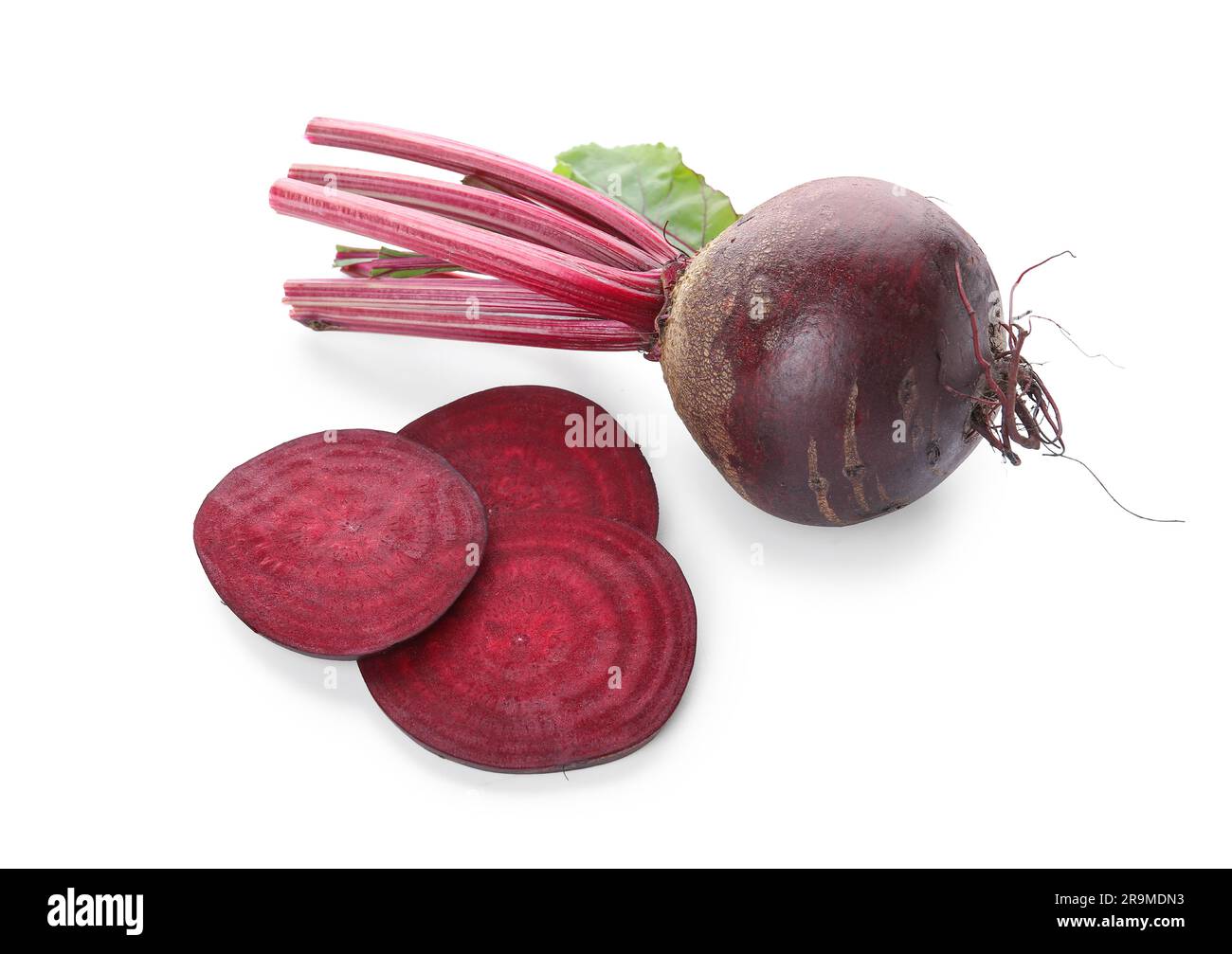 Fresh beet and cut slices on white background Stock Photo - Alamy