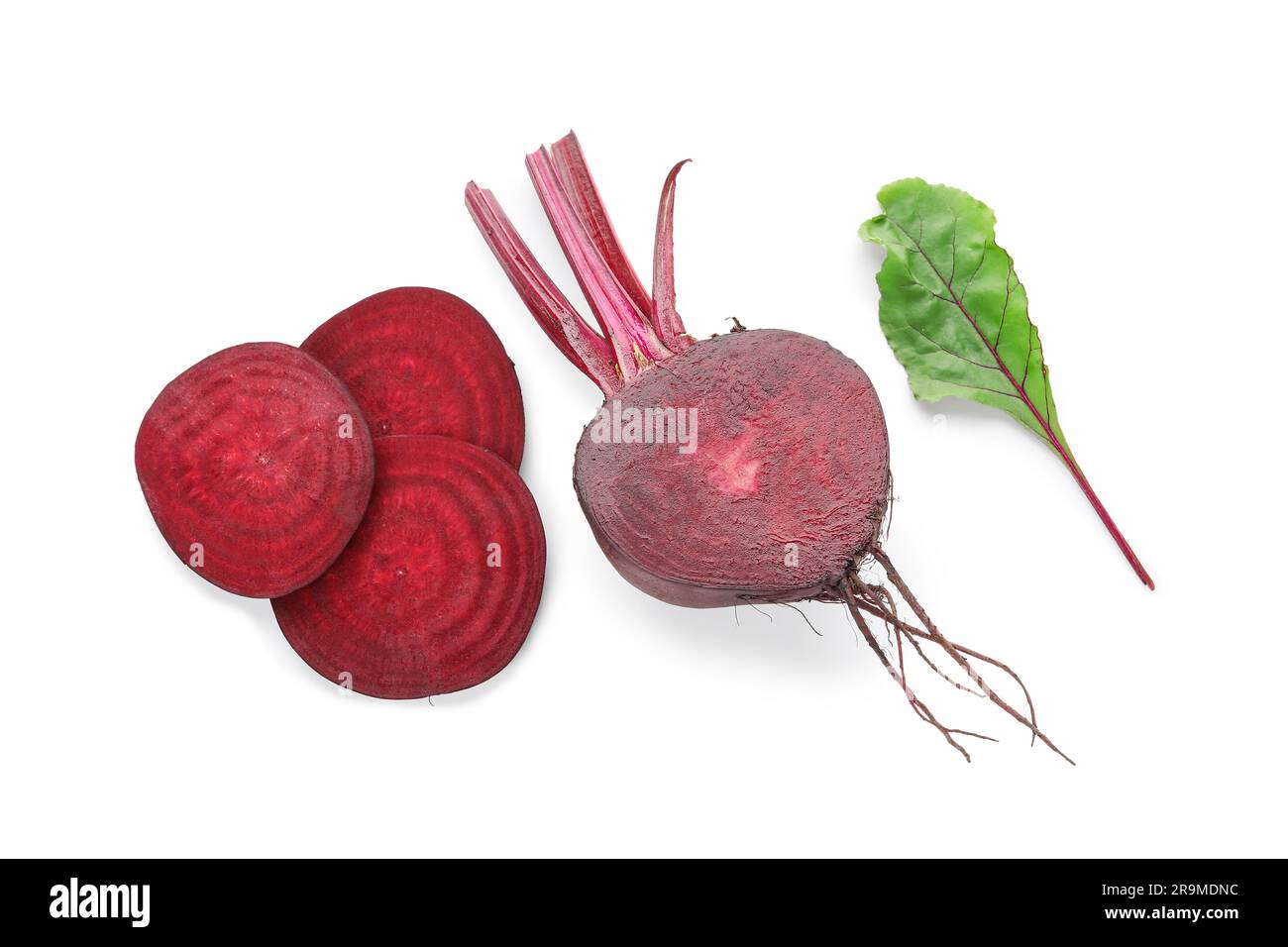 Half of fresh beet, cut slices and leaf on white background Stock Photo ...