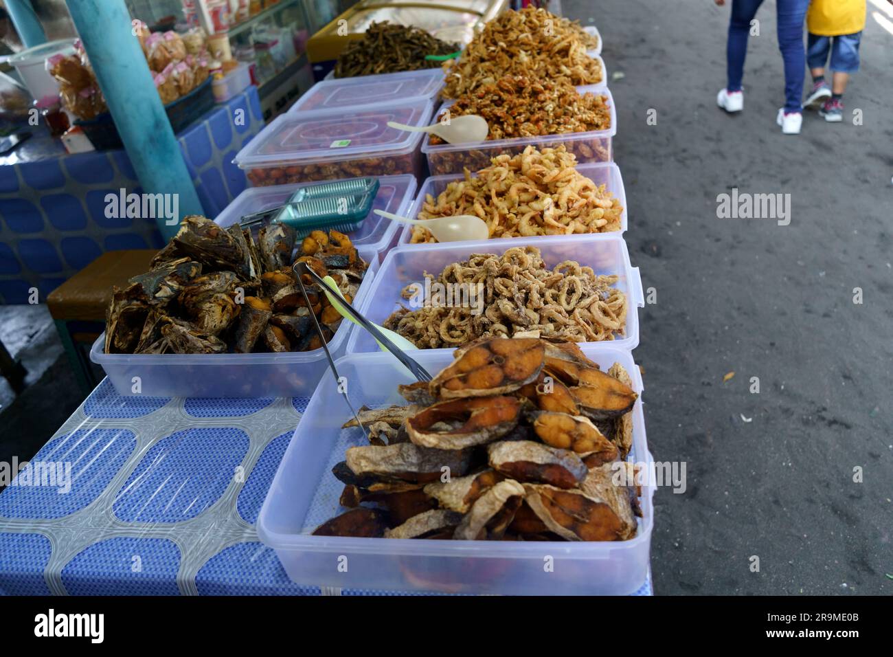Crispy shrimps, crispy crabs and fried fish sold at food stands at ...