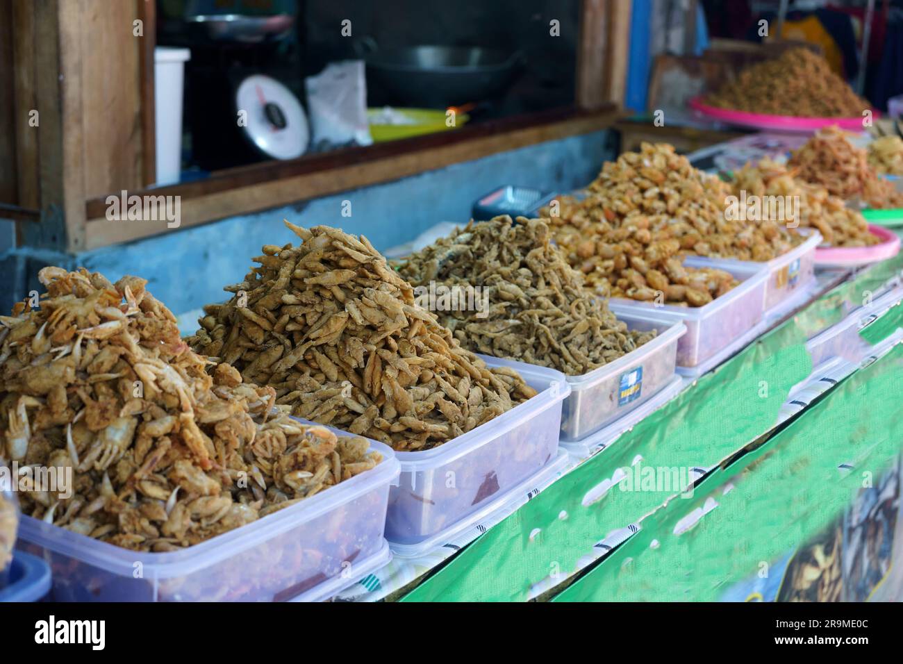 Crispy shrimps, crispy crabs and fried fish sold at food stands at ...