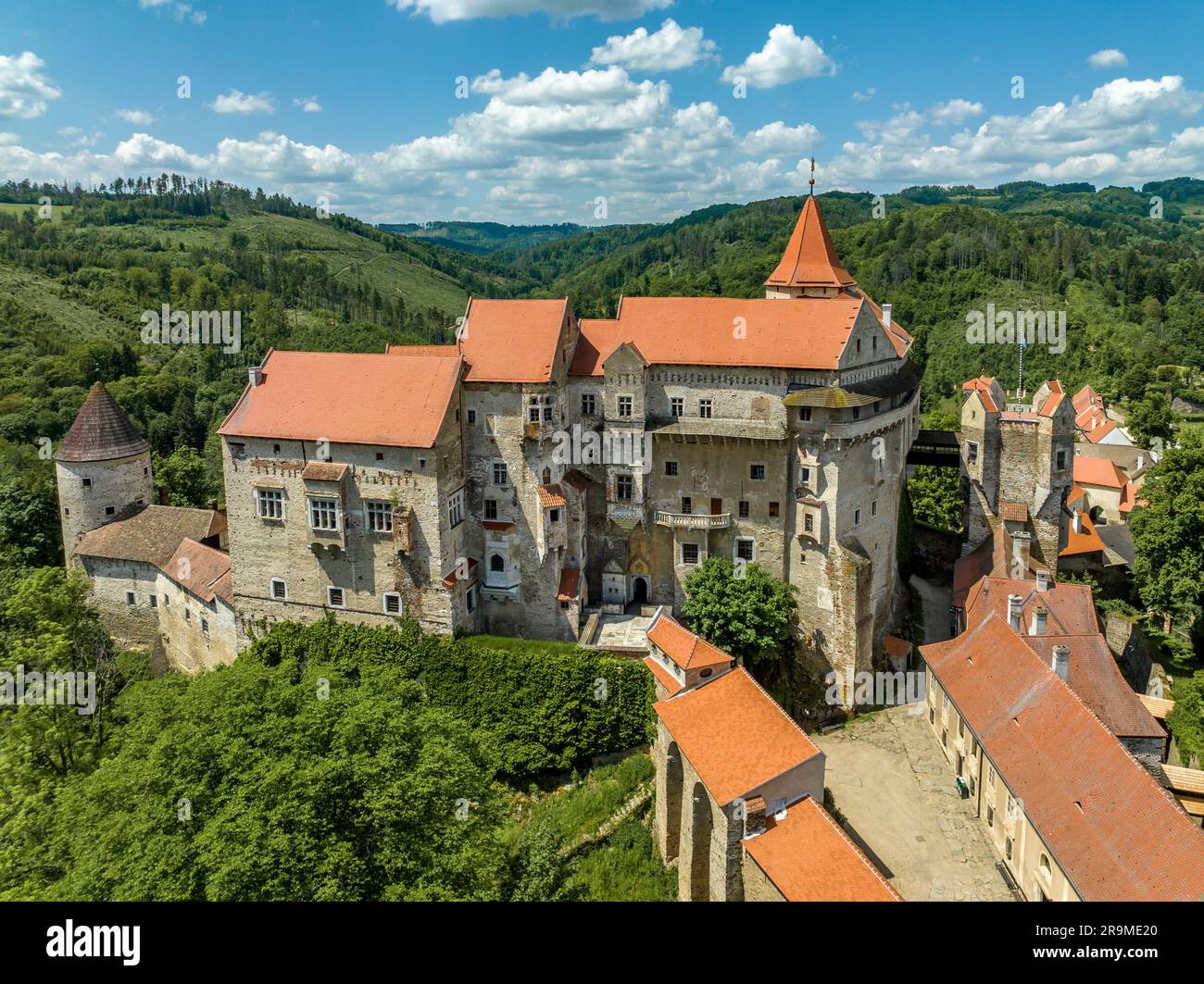 Aerial view of Pernstejn castle with Gothic palace red roof ...