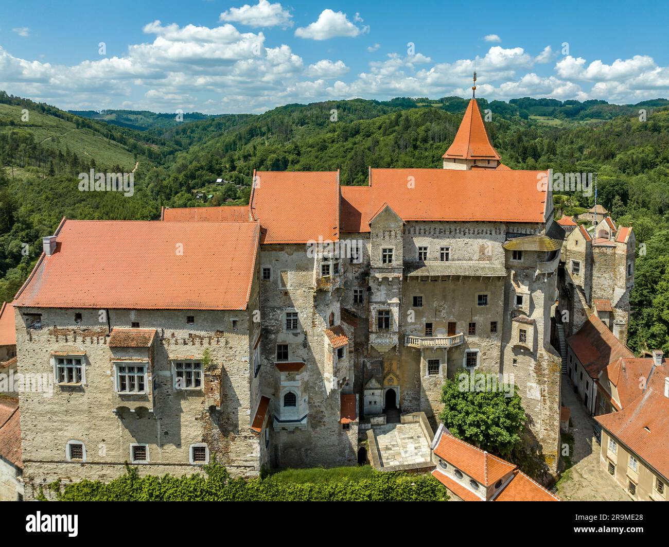Aerial view of Pernstejn castle with Gothic palace red roof ...