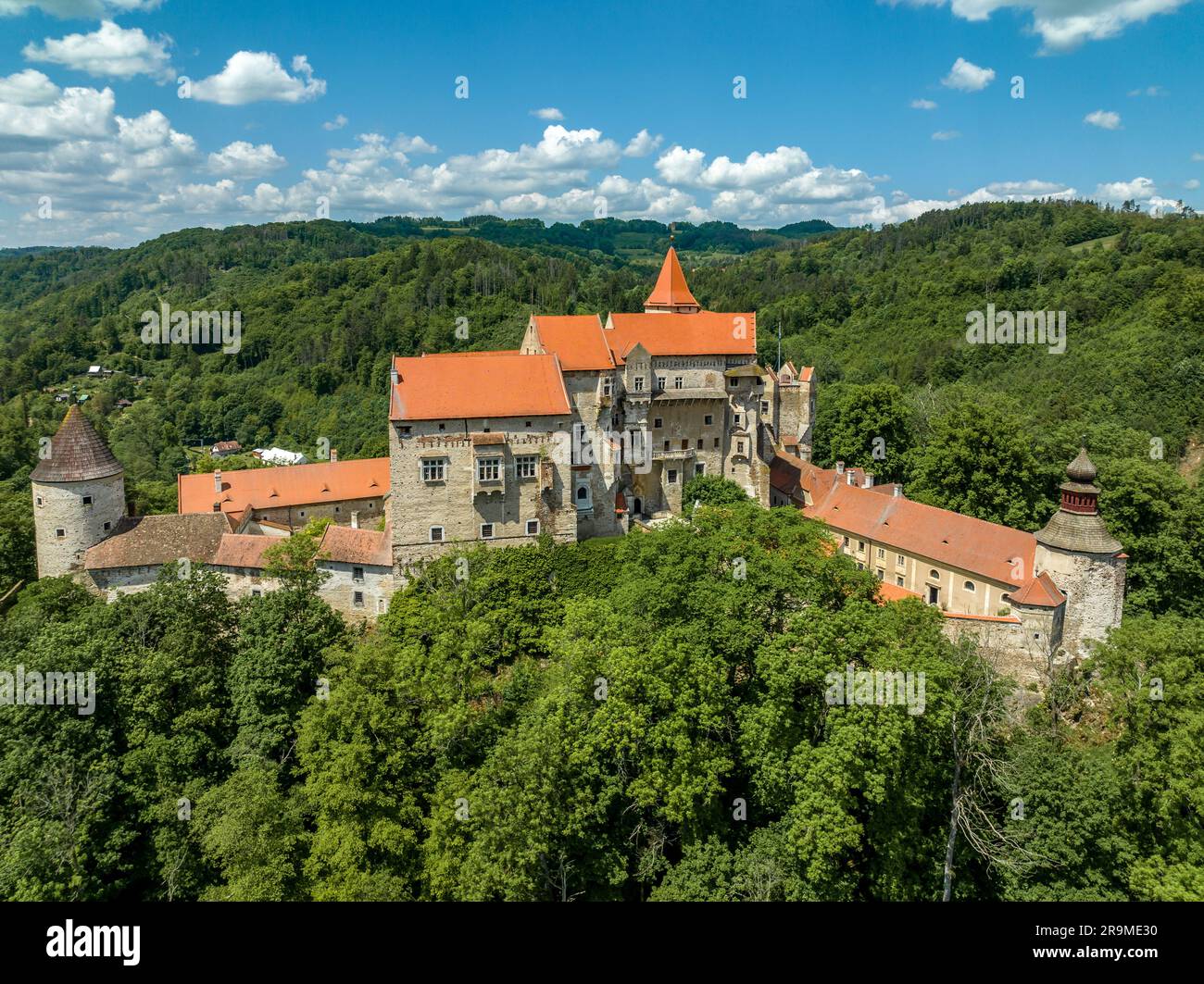 Aerial view of Pernstejn castle with Gothic palace red roof ...