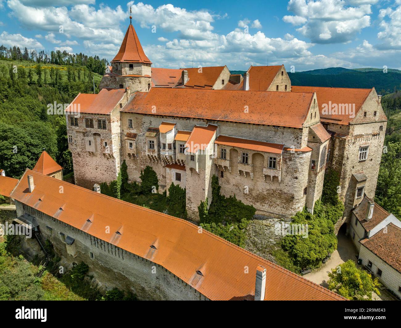 Aerial view of Pernstejn castle with Gothic palace red roof ...
