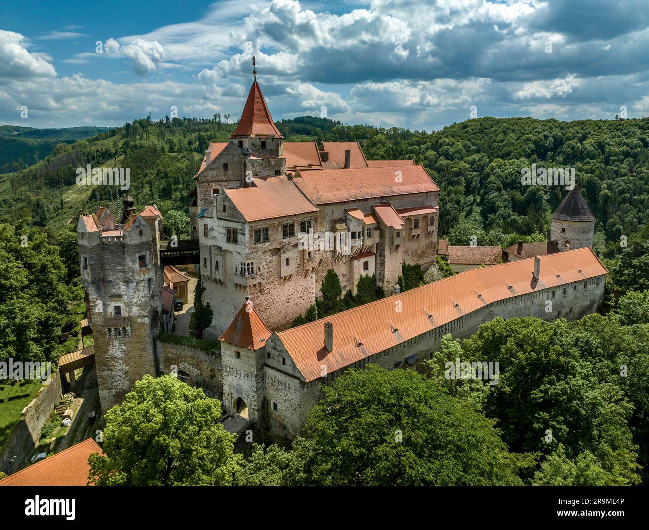 Aerial view of Pernstejn castle with Gothic palace red roof ...