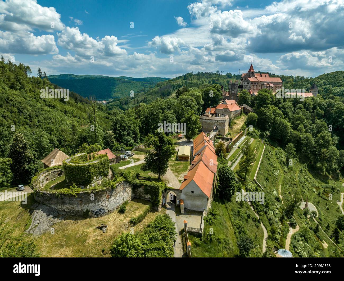 Aerial view of Pernstejn castle with Gothic palace red roof ...