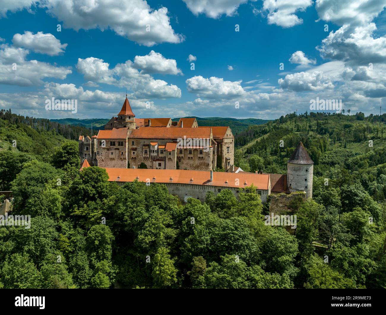 Aerial view of Pernstejn castle with Gothic palace red roof ...