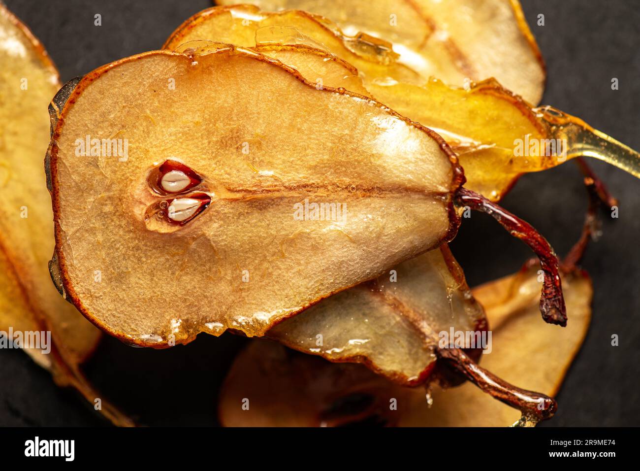 Candied pear chips, first dehydrated and then dipped in a caramel sugar ...