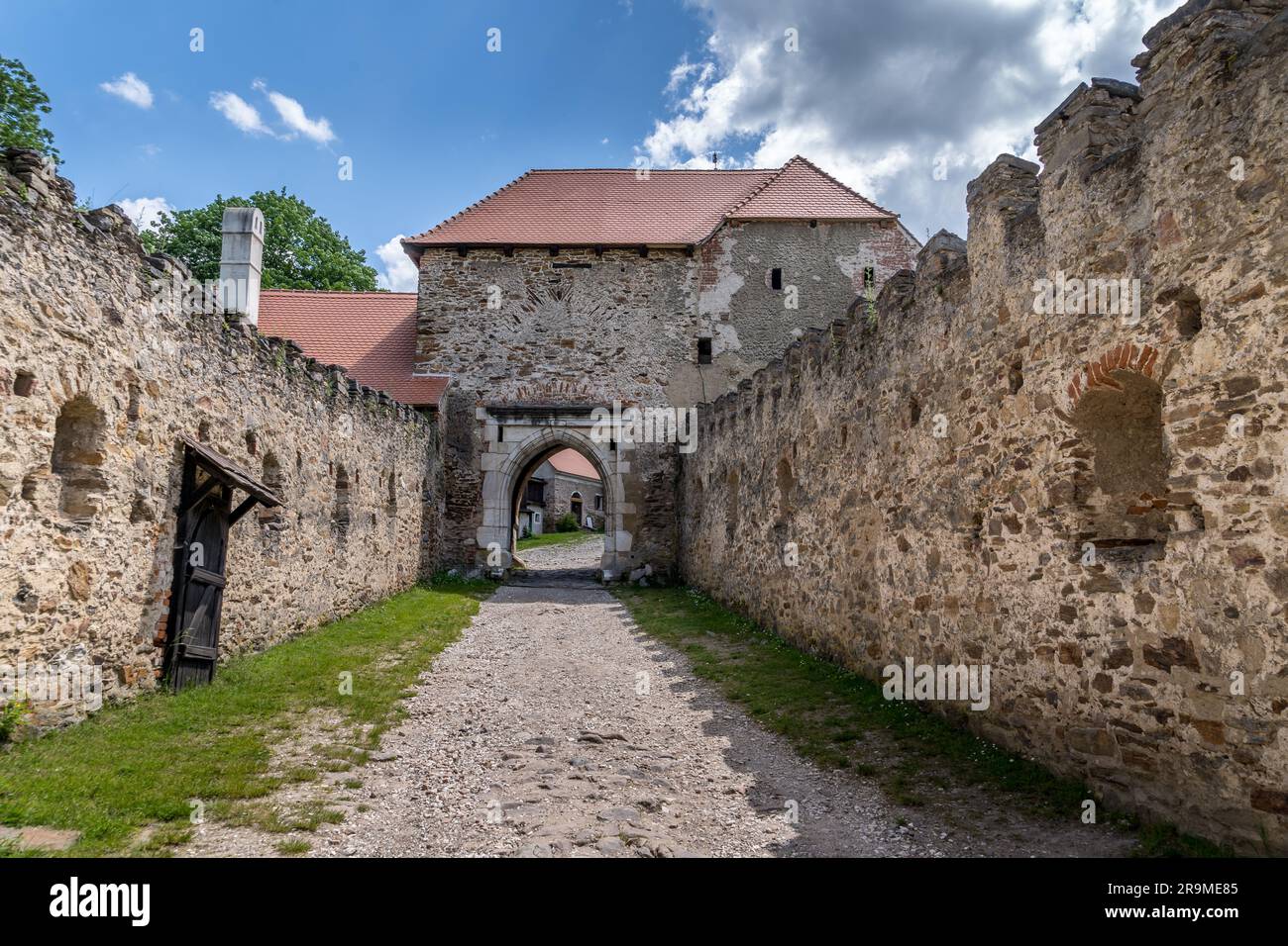 Aerial view of Pernstejn castle with Gothic palace red roof ...
