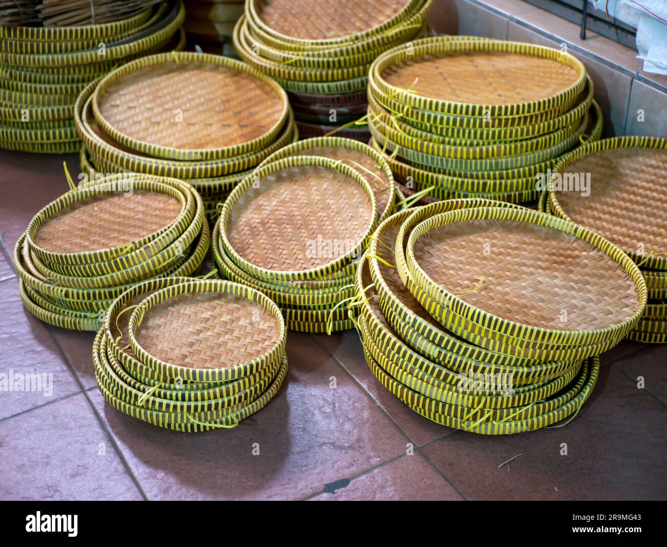 Hand woven bamboo rice basket hi-res stock photography and images - Alamy