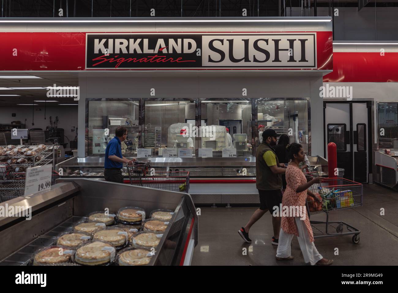 A vibrant image captures a bustling scene at a Costco food court ...
