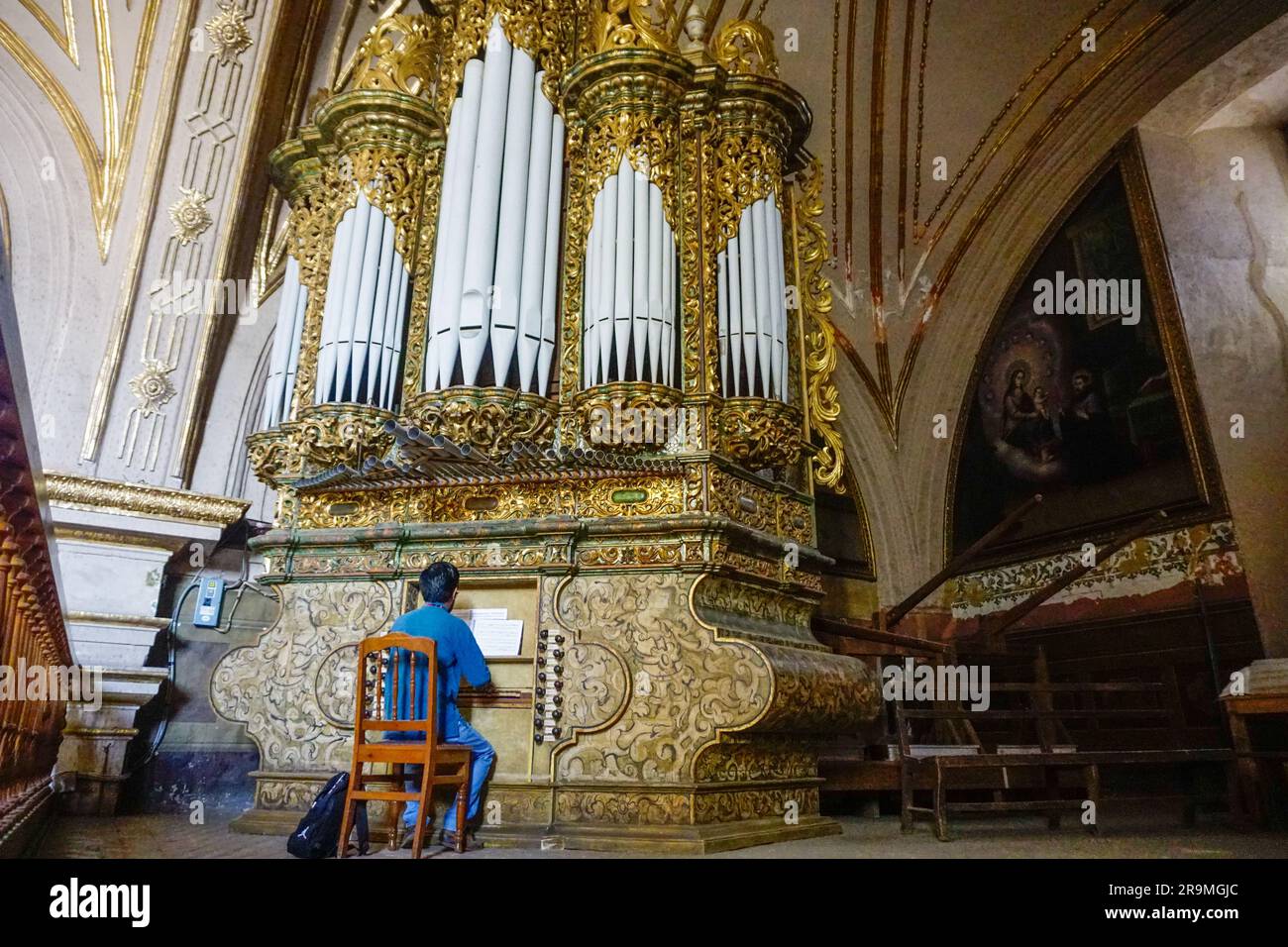 Isaí Guzmán plays a 17th-century organ, which was restored in 2000, at ...