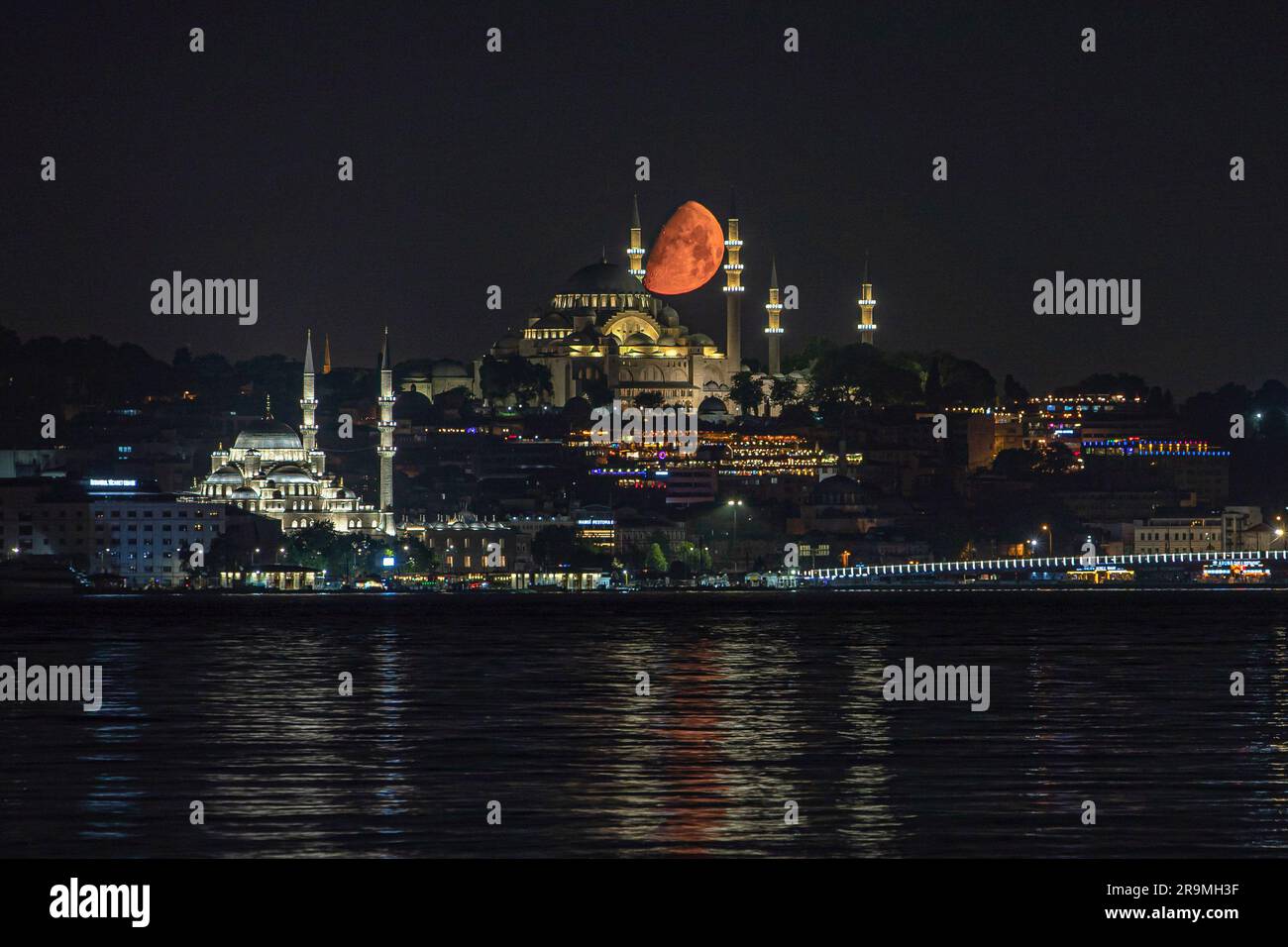 Istanbul, Turkey. 28th June, 2023. A half moon sets behind the ...