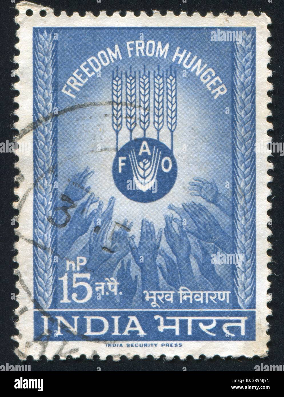 INDIA - CIRCA 1953: stamp printed by India, shows ears of rye and hands ...