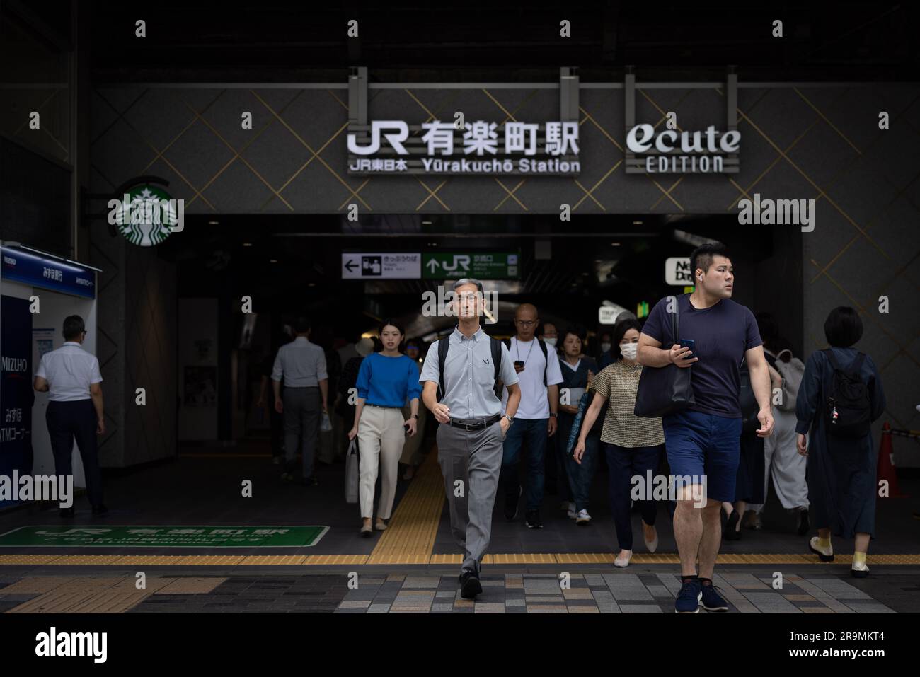 Tokyo, Japan. 27th June, 2023. Subway passengers exit Yurakucho station ...