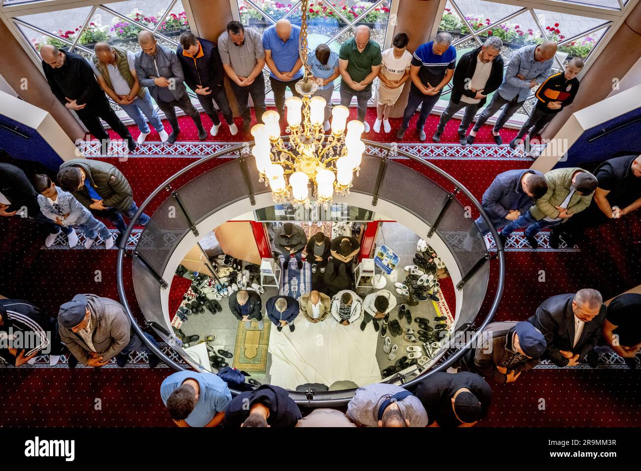 ROTTERDAM - Muslims during morning prayer in the Mevlana Mosque. This ...