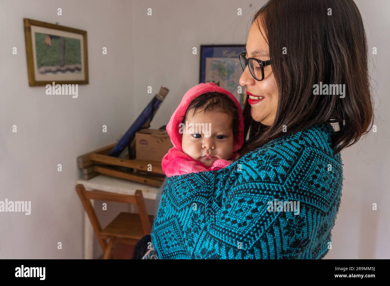 Rubí Yarene Núñez Trejo holds her daughter, Esther, at a workshop for women environmental ...