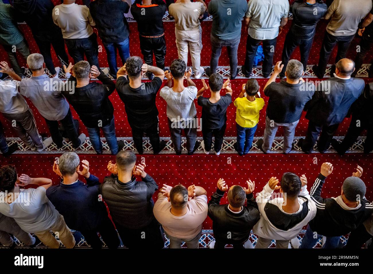 ROTTERDAM - Muslims during morning prayer in the Mevlana Mosque. This ...