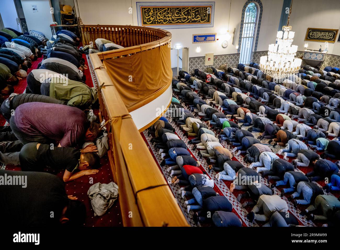 ROTTERDAM - Muslims during morning prayer in the Mevlana Mosque. This ...