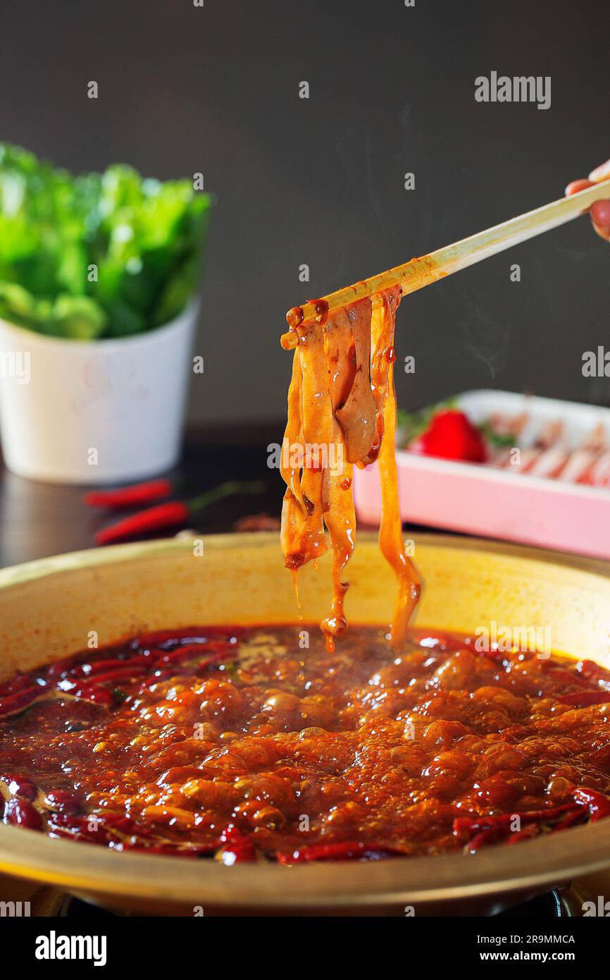 traditional hot pot combo, sweet garlic, and beef slices. It’s very ...