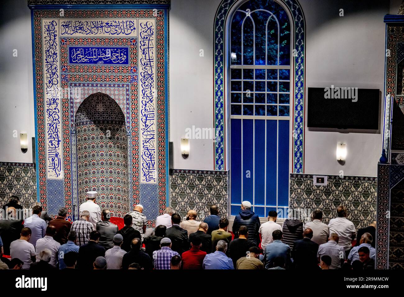 ROTTERDAM - Muslims during morning prayer in the Mevlana Mosque. This ...