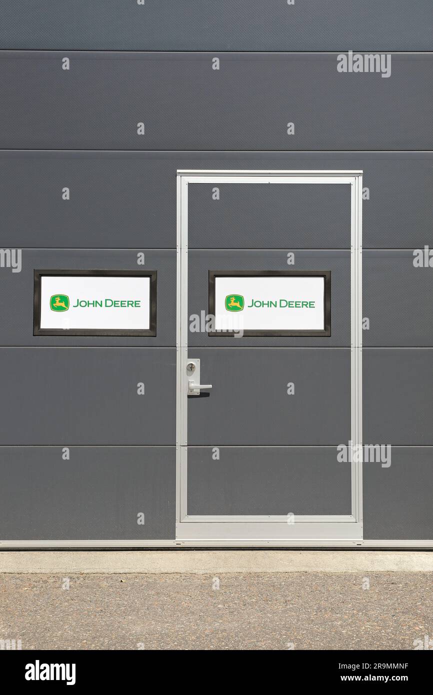 John Deere logo on the door and building exterior at the John Deere ...