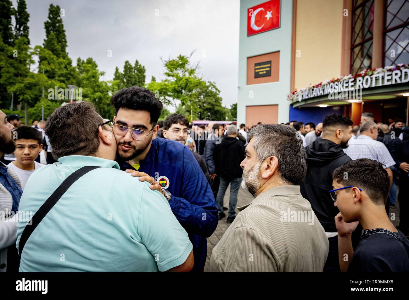 ROTTERDAM - Muslims after morning prayer in the Mevlana Mosque. This is ...