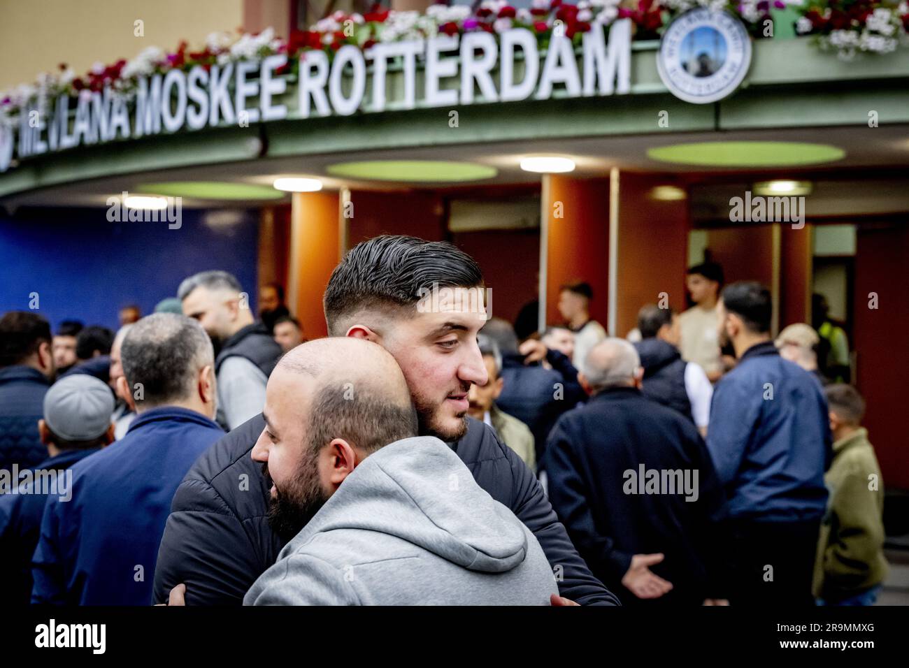 ROTTERDAM - Muslims after morning prayer in the Mevlana Mosque. This is ...
