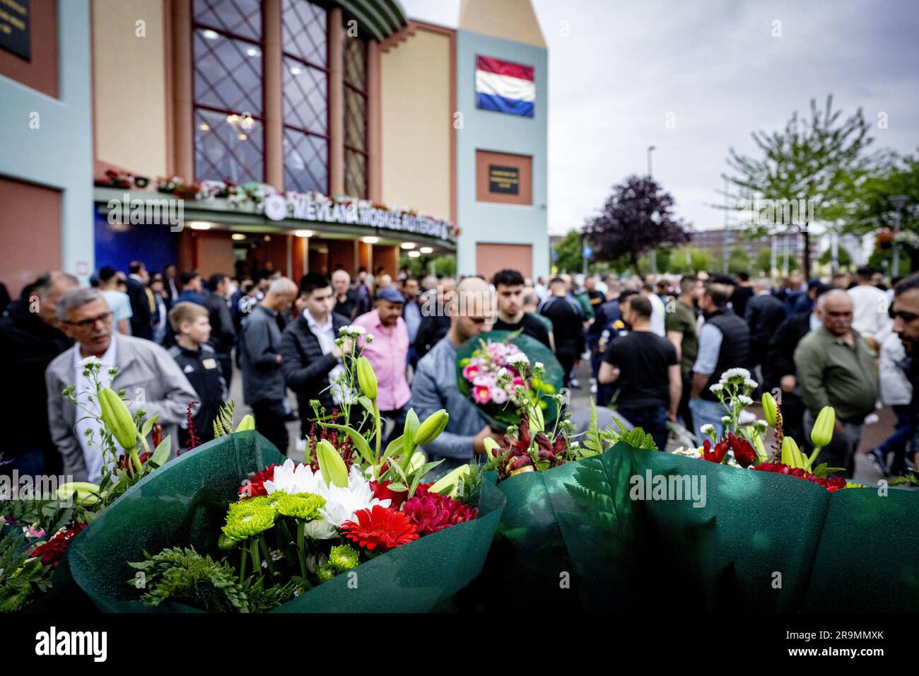 ROTTERDAM - Muslims after morning prayer in the Mevlana Mosque. This is ...