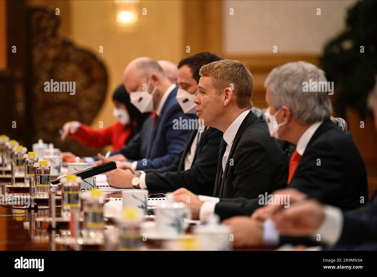 New Zealand Prime Minister Chris Hipkins, second right, attends a ...