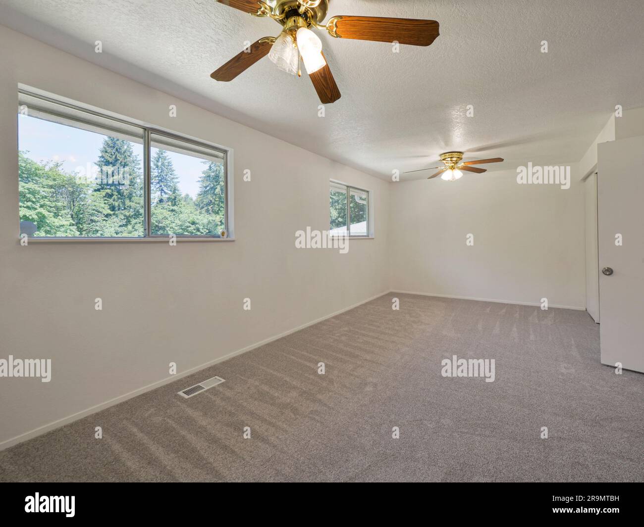 Modern residential empty bedroom interior Stock Photo - Alamy