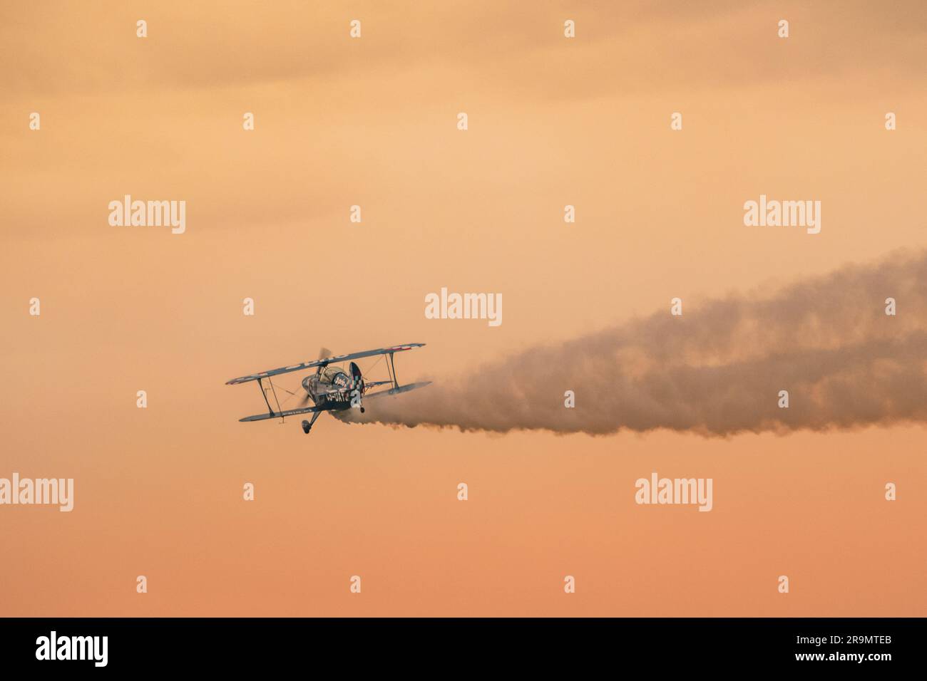Small plane with smoke trail hi-res stock photography and images - Alamy