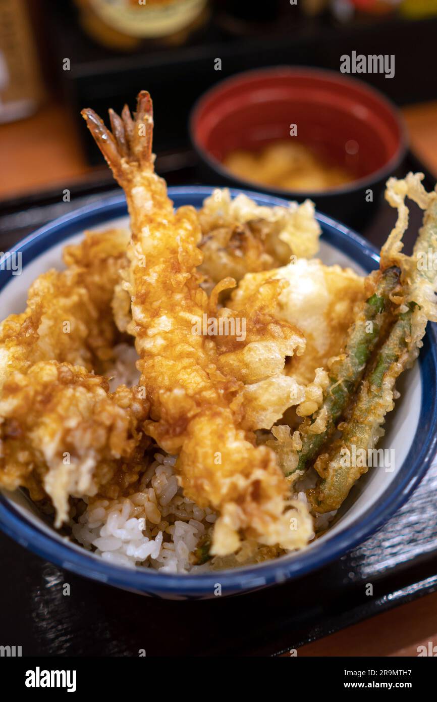 A bowl of Japanese food, tempura on rice in Tokyo Japan Stock Photo - Alamy