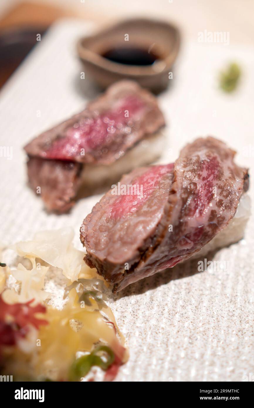 Japanese raw beef sushi with rice in Tokyo Japan Stock Photo - Alamy