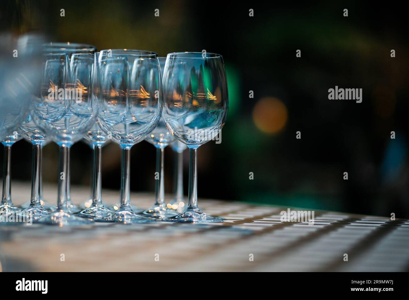 Luxury table settings for fine dining with and glassware, pouring wine ...