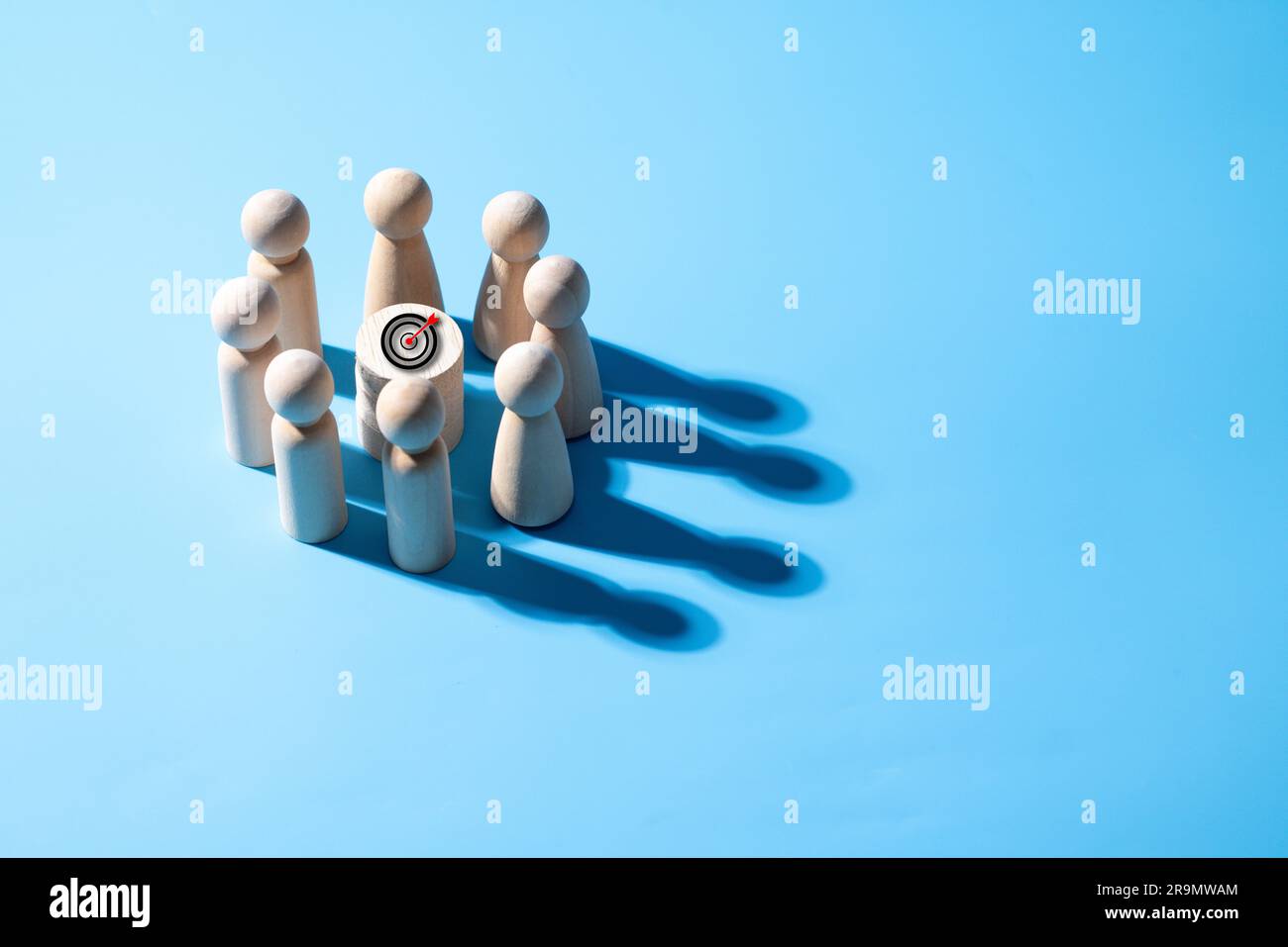 A wooden business teamwork symbol. Leadership styles concept of ...