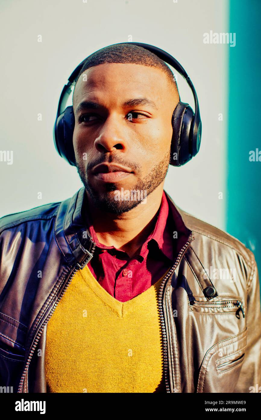 African american man listening audio hi-res stock photography and images - Alamy