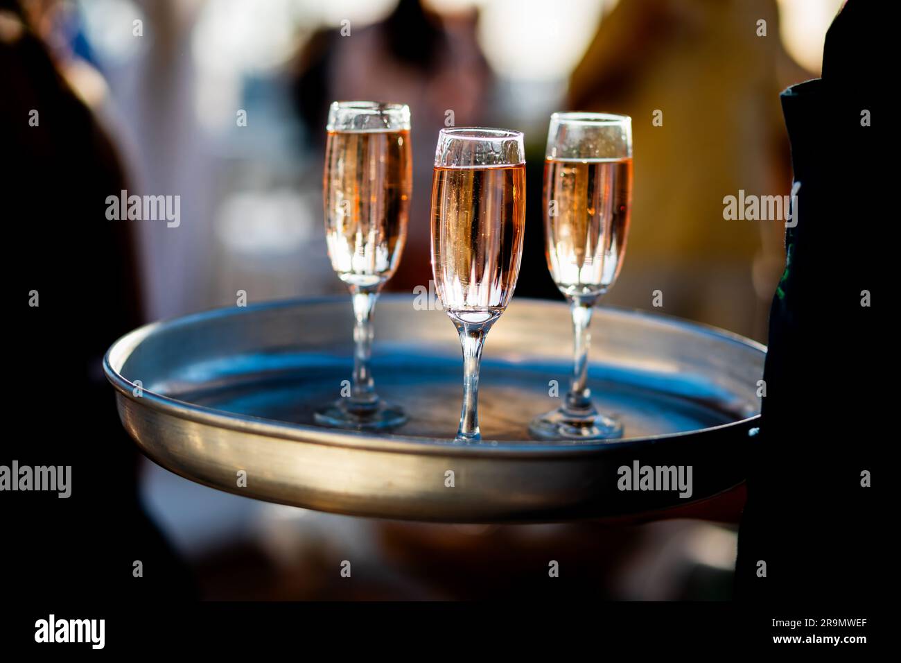 Luxury table settings for fine dining with and glassware, pouring wine ...